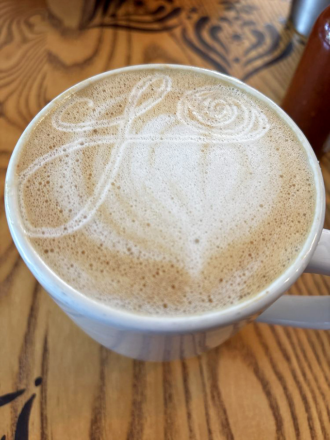 Coffee art so pretty you almost don't want to drink it—almost. This latte's delicate design is the caffeinated equivalent of a morning pep talk.