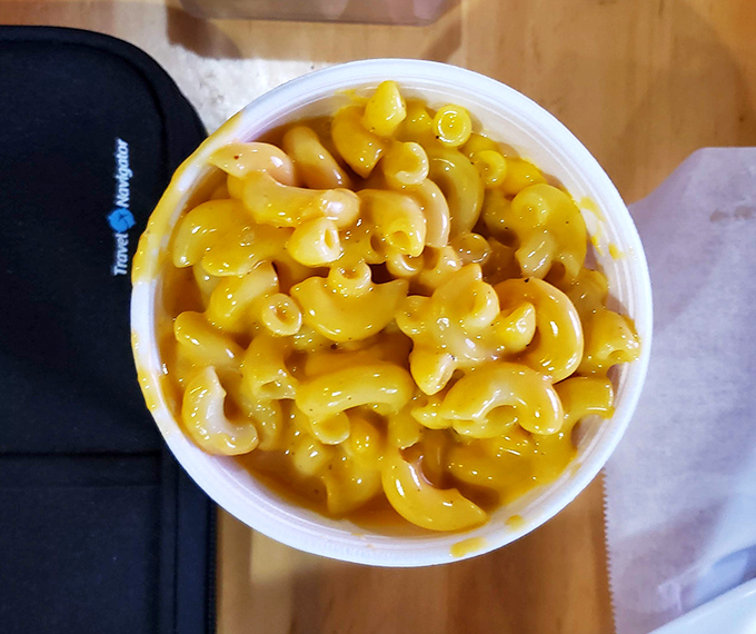 This mac and cheese isn't just a side—it's a strategic defense system against the chicken's heat assault. Creamy, cheesy tactical support.