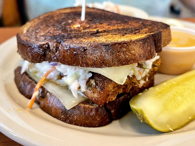 The Mahi Reuben—where Florida meets New York in a sandwich summit. This cross-cultural masterpiece proves that fish can do everything pastrami can, but with a tan.