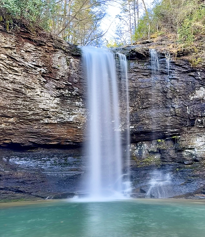 This waterfall doesn't just cascade—it hypnotizes. The kind of view that makes you forget about your phone for a solid twenty minutes.