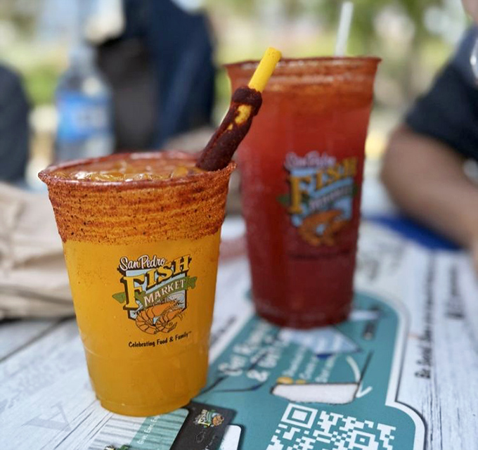 These vibrant micheladas aren't just drinks – they're liquid sunshine with a spicy kick that perfectly complements the seafood feast.