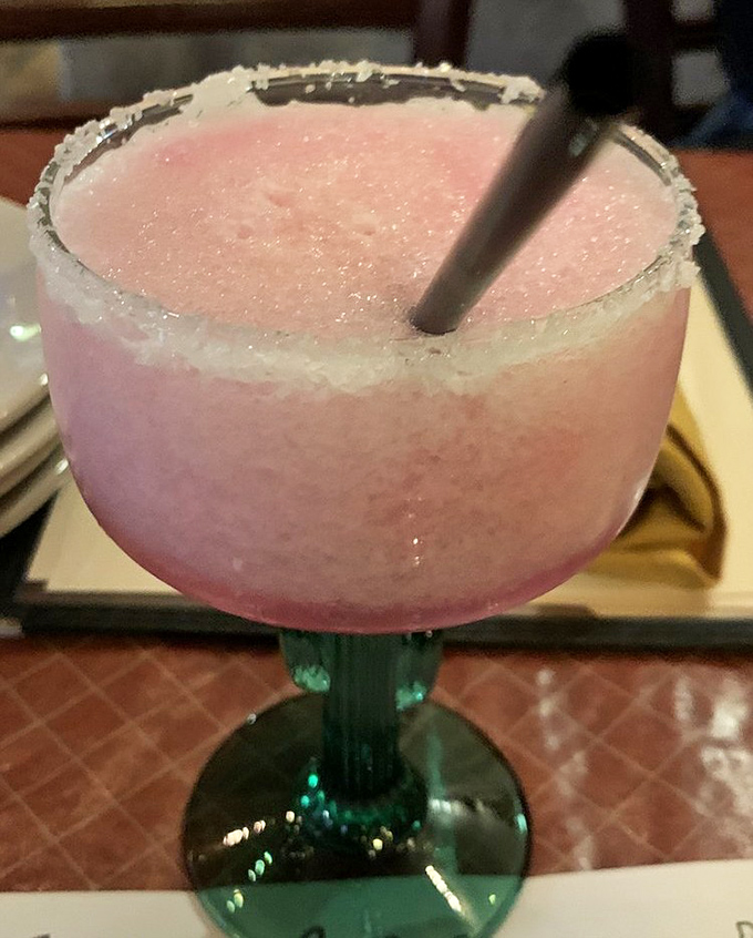 The prickly pear margarita—Arizona in a glass, with a salt rim that's like the desert meeting the sea in delicious harmony.