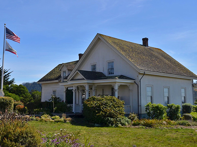 This isn't just any white house with a flag—it's a portal to Mendocino's past, where history is preserved with the same care as a fine wine.