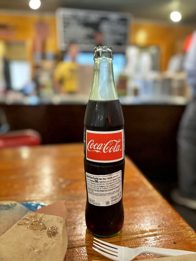 Nothing complements barbecue quite like an ice-cold Mexican Coke in a glass bottle. The perfect companion for your meat journey.