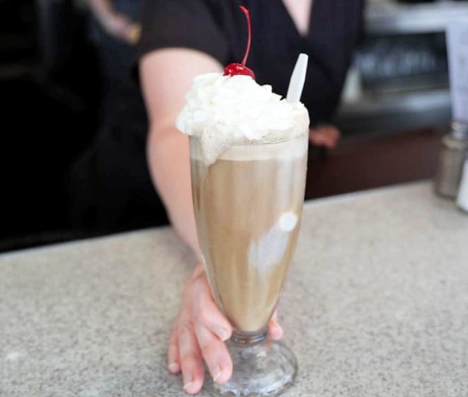 This isn't just a milkshake; it's a frothy time machine that transports you back to when calories didn't count and joy was measured in sips.