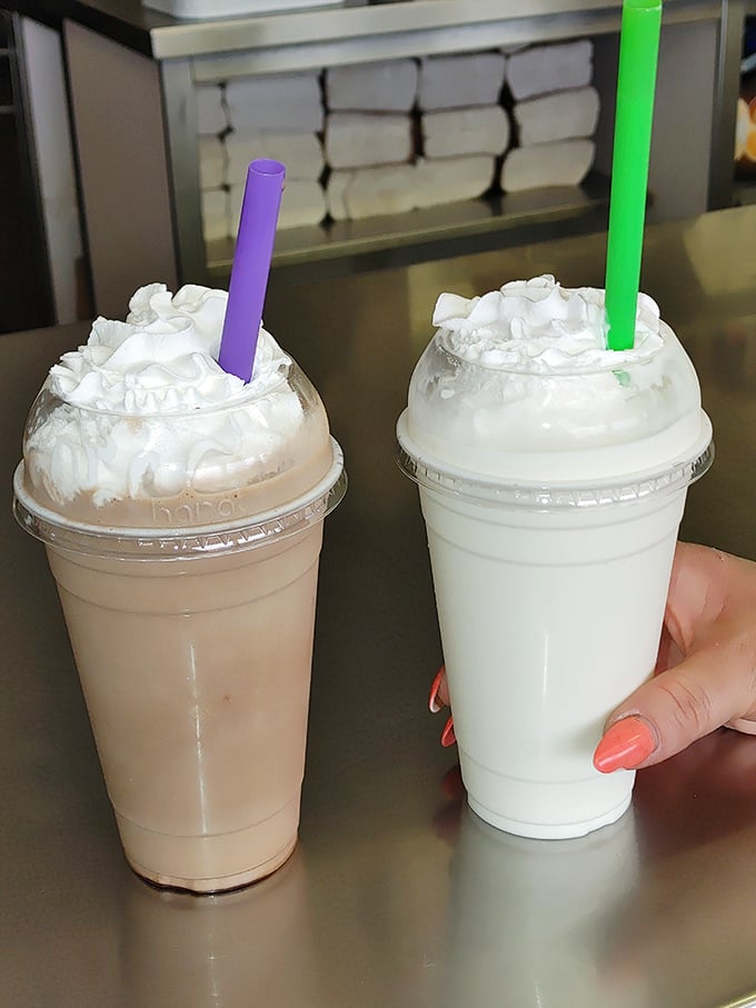 Milkshakes thick enough to require serious straw commitment, topped with clouds of whipped cream. Your diet plan just called – it's taking the day off.