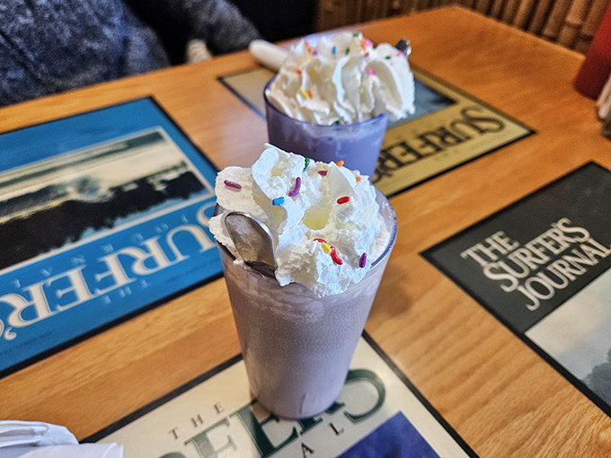 Milkshakes with sprinkles and whipped cream mountains—proof that sometimes the best breakfast is actually dessert in disguise.
