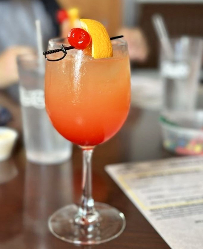 This isn't just a mimosa – it's liquid sunshine with a sword-skewered cherry. Florida in a glass, minus the humidity and traffic. 