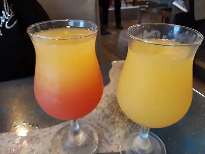 Morning mimosas with a view—because watching waves while sipping sunshine in a glass is California's version of breakfast meditation.