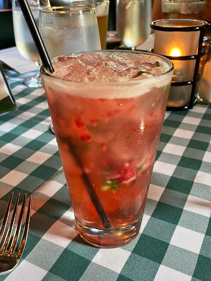 This isn't just a cocktail—it's summer in a glass, with fresh berries and mint creating a refreshing escape from Wisconsin winters.