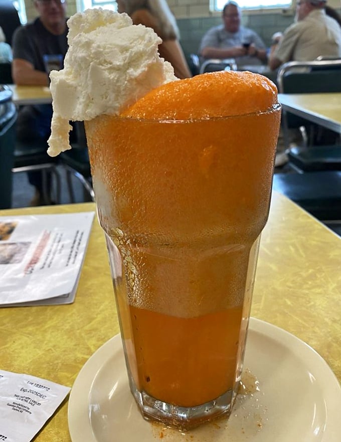 The orange float—where creamy vanilla ice cream meets fizzy orange soda in a tall glass romance that's lasted longer than most Hollywood marriages.