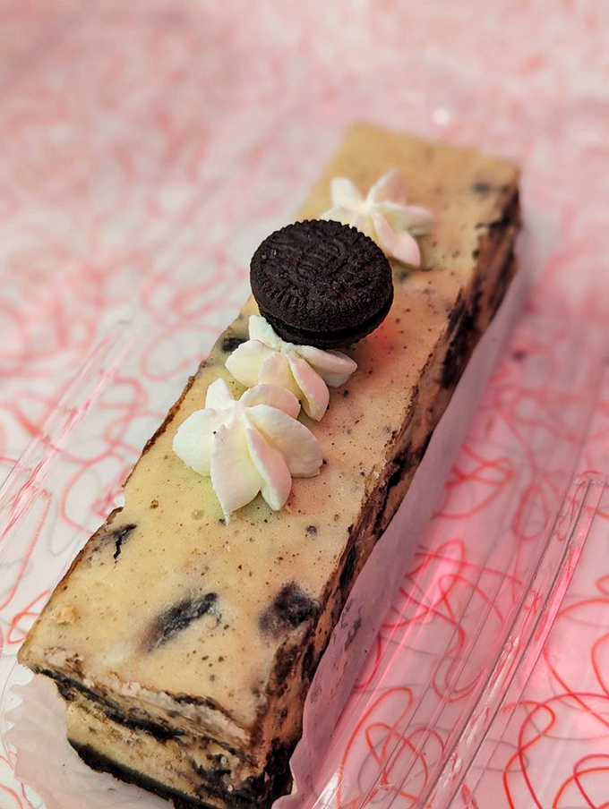 Cookies and cream cheesecake that's dressed for success—Oreo has never looked more sophisticated than atop this velvety masterpiece.