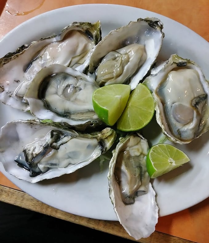 Fresh oysters with lime—ocean perfection on a plate. Sometimes the simplest pleasures require the least explanation.