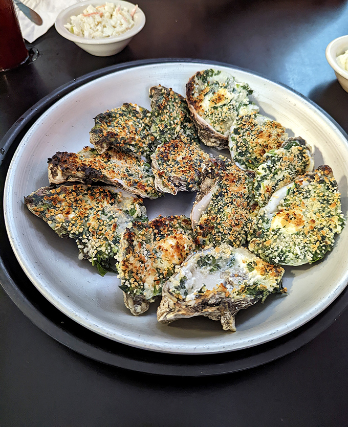 Oysters Rockefeller—where the ocean meets butter, breadcrumbs, and herbs in a romance so perfect it deserves its own Netflix series.