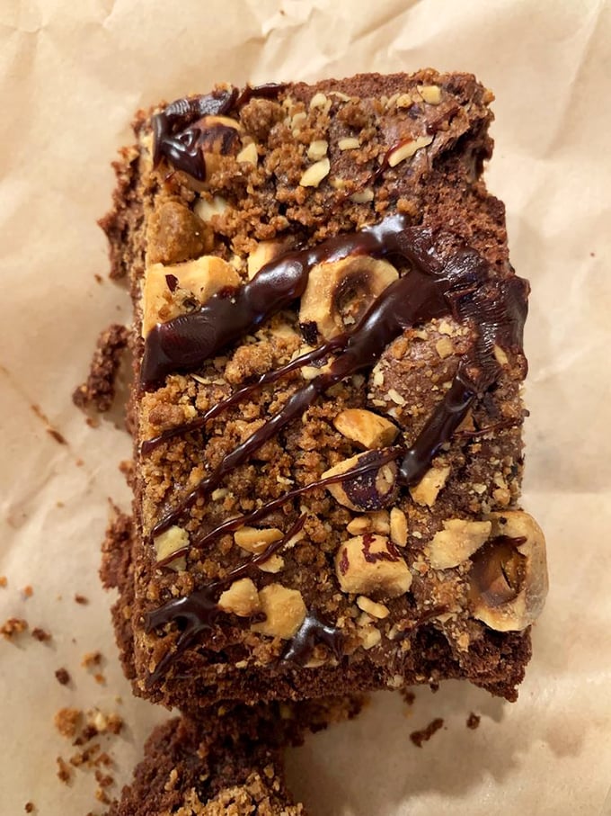 This brownie isn't messing around. The chocolate drizzle and nut topping are like jewelry for your dessert—elegant but not pretentious.