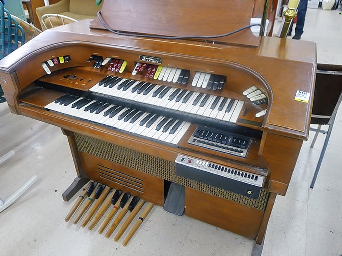 This vintage organ isn't just furniture – it's a time machine waiting for someone to play "Tiny Dancer" in their living room.