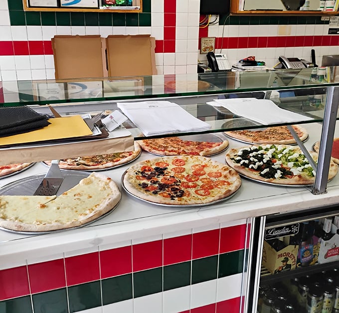 Pizza variety on display like edible art – the Louvre's got nothing on this delicious gallery.
