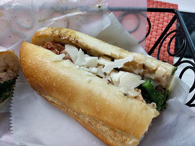 The Porchetta sandwich whispers sweet nothings to your taste buds with roasted pork, broccoli rabe, and that heavenly rosemary aioli.