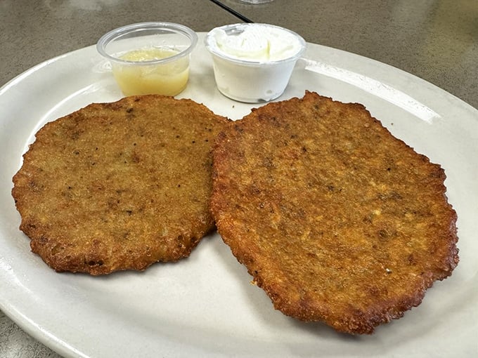 Golden-brown potato pancakes that would make your grandmother both jealous and proud. Crispy edges, tender centers—the textural yin and yang we all need.