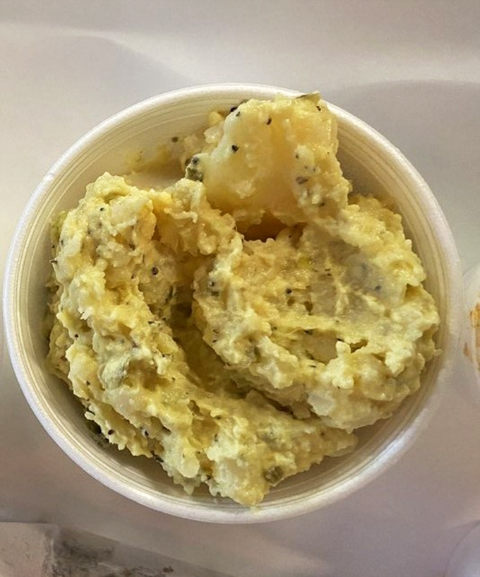 Potato salad that knows its role – the perfect supporting actor to the meaty stars of the show, with just enough personality to stand out.