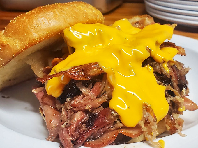 When cheese this vibrant cascades over pulled pork this tender, you don't question it – you simply thank the BBQ gods for their delicious blessings.