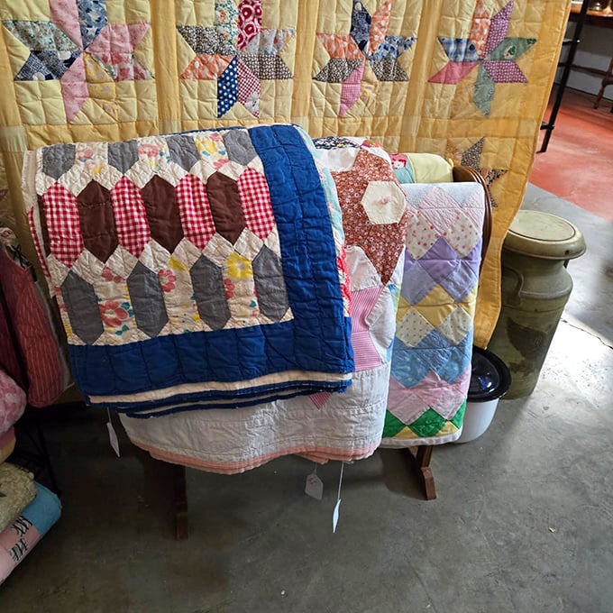 Handstitched history unfolds in the quilt section. Each colorful pattern represents countless hours of craftsmanship and tradition passed through generations.