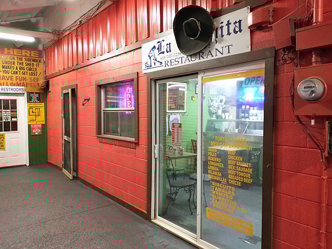 La Casita Restaurant brings authentic flavors to hungry shoppers. That giant sombrero on the wall isn't just decoration—it's a promise of culinary adventure.