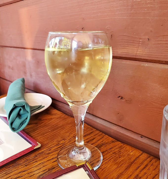 A glass of crisp Riesling waiting patiently to complement your meal – like finding the perfect dance partner who knows all your moves.
