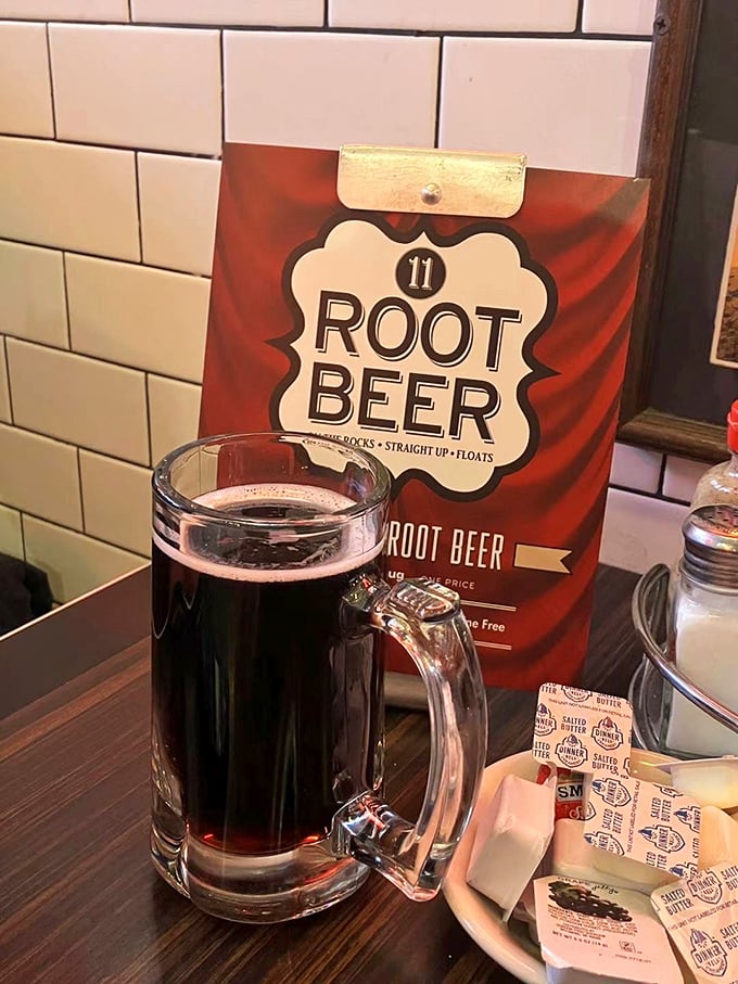 Root beer served in a mug so frosty it could survive global warming. The vintage menu card reminds us some pleasures never need upgrading.
