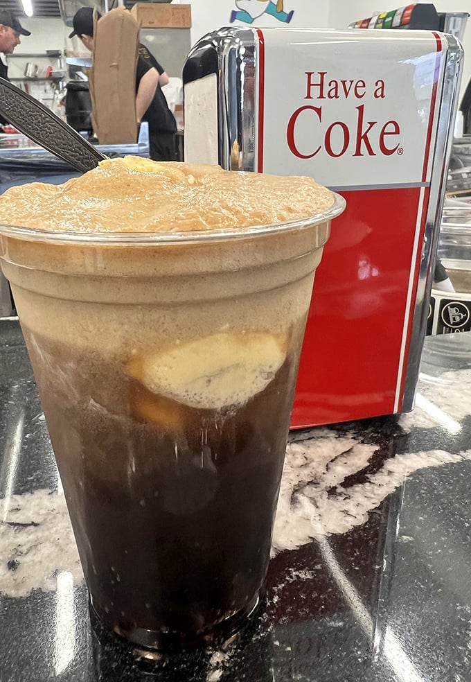 The classic Coke float—where soda and ice cream perform their timeless dance of fizzy, creamy perfection.