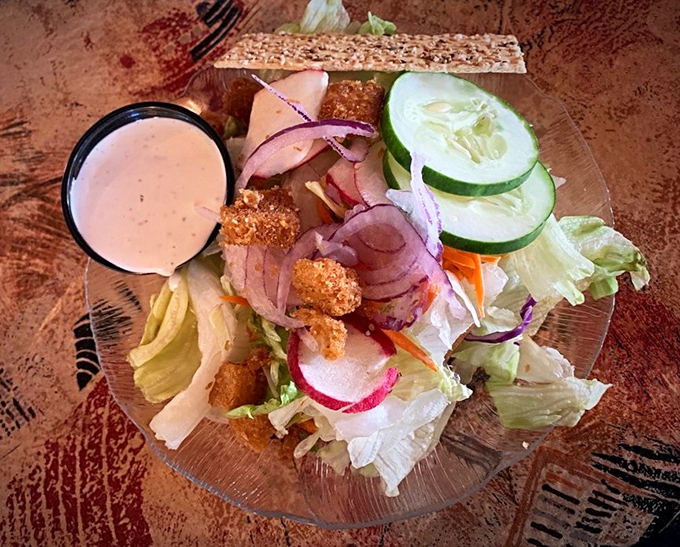 A salad that actually excites—crisp, colorful, and thoughtfully composed. That creamy dressing is the perfect finishing touch to this fresh ensemble.