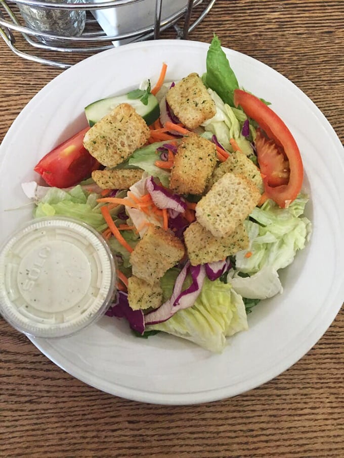A garden-fresh salad with house-made croutons—because sometimes you need something green before diving back into burger territory.