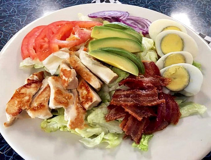 A salad that doesn't apologize for being healthy – it just brings along bacon, avocado, and egg to make sure you're still having fun.