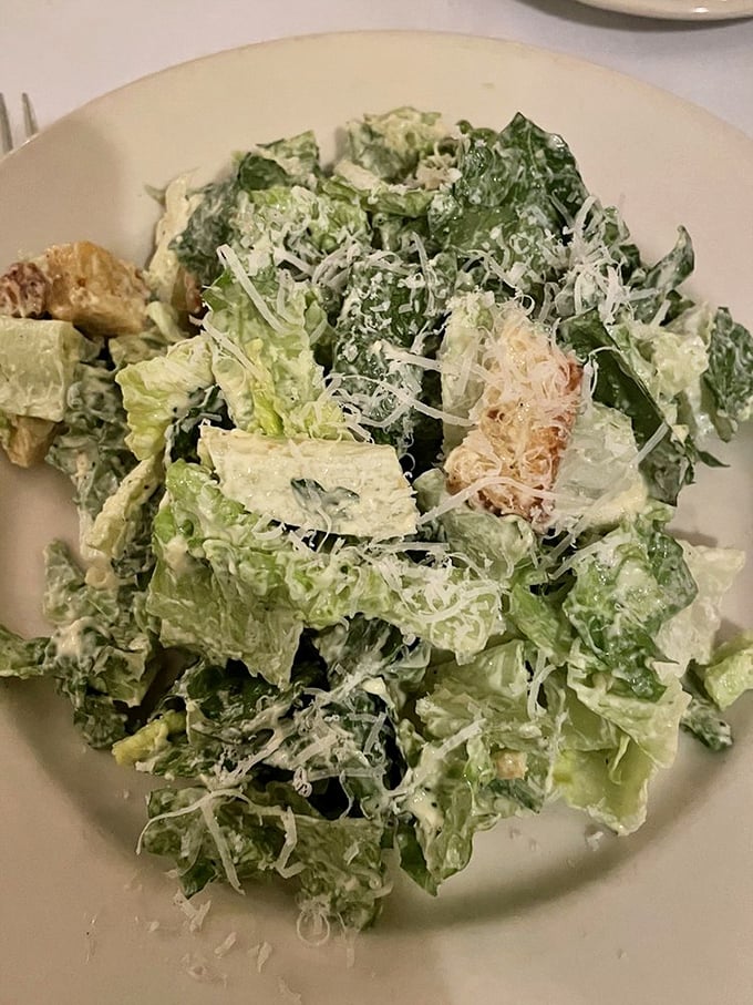 A Caesar salad that actually deserves its imperial name – crisp, perfectly dressed, and offering the illusion of virtue before pasta arrives.