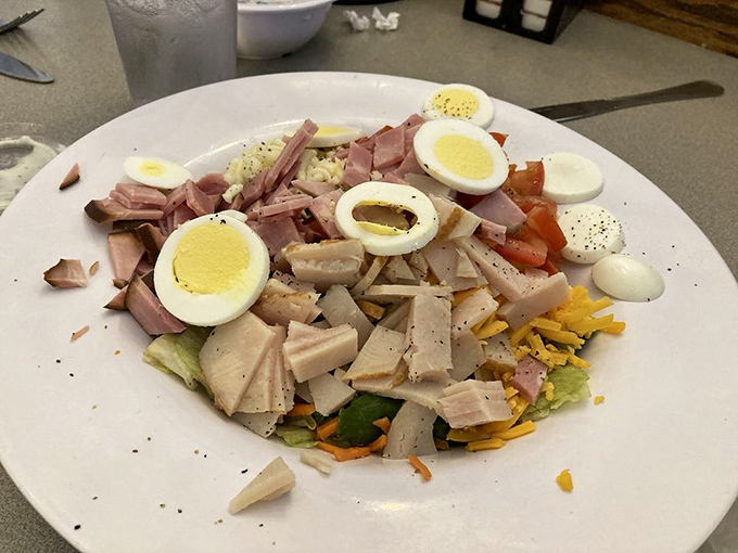 A chef salad that doesn't apologize for being exactly what it is – hearty, unpretentious, and probably the healthiest thing you'll order here.