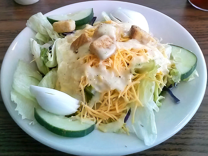A salad that doesn't apologize for being a salad—fresh, colorful, and proving that not everything delicious at a diner requires gravy.