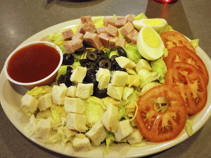 A salad that doesn't apologize for being exactly what it is – fresh, colorful, and arranged with the precision of a Wisconsin grandmother setting her holiday table.