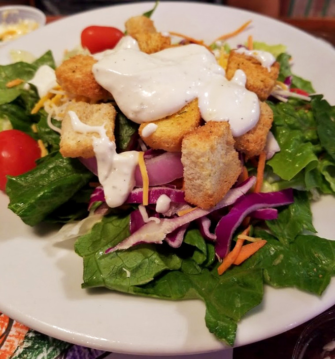 Even the salads here mean business. Fresh greens topped with homemade dressing and crunchy croutons—proof that not everything delicious needs to be fried.