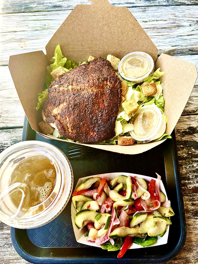 This blackened salmon salad proves healthy eating doesn't require sacrifice. The fish wears its seasoning like a perfectly tailored suit – impressive without trying too hard.