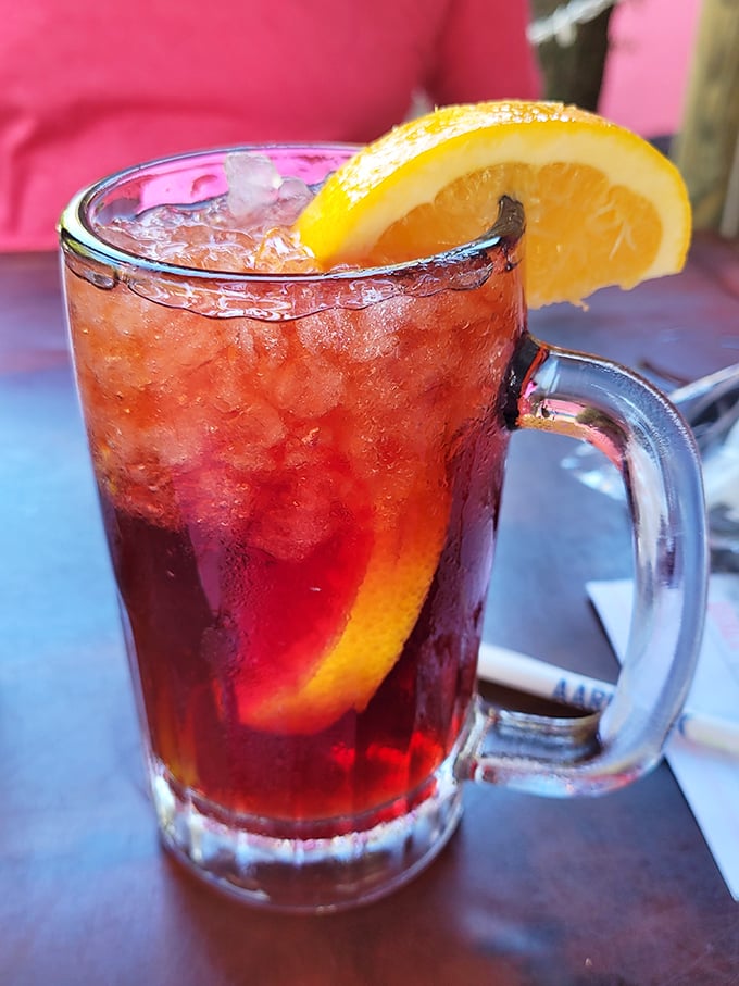 This isn't just sangria—it's vacation in a glass. Ruby-red, fruit-laden, and cold enough to combat Florida's heat with delicious efficiency.