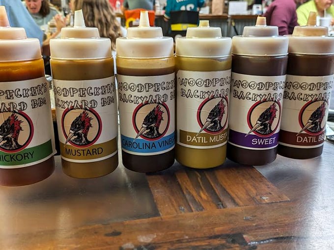 The sauce lineup – like the Avengers of flavor, each with its own superpower. The Carolina Vinegar brings tang while Datil brings the local heat.