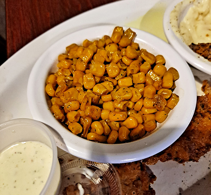 Sweet corn kernels glistening with butter and seasonings—proof that even the simplest sides get star treatment at Lowake.