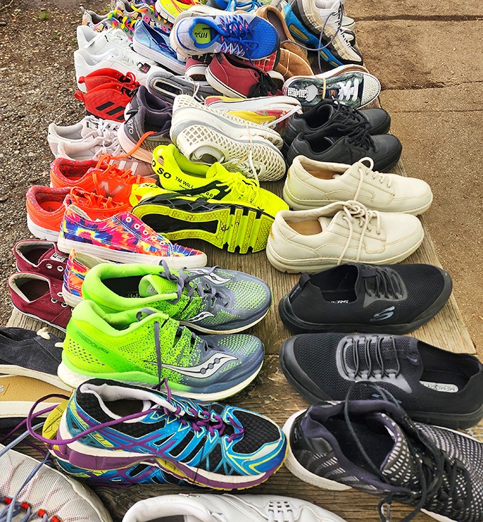 The sneaker rainbow offers everything from neon running shoes to sensible walking partners—footwear with previous lives and future adventures.