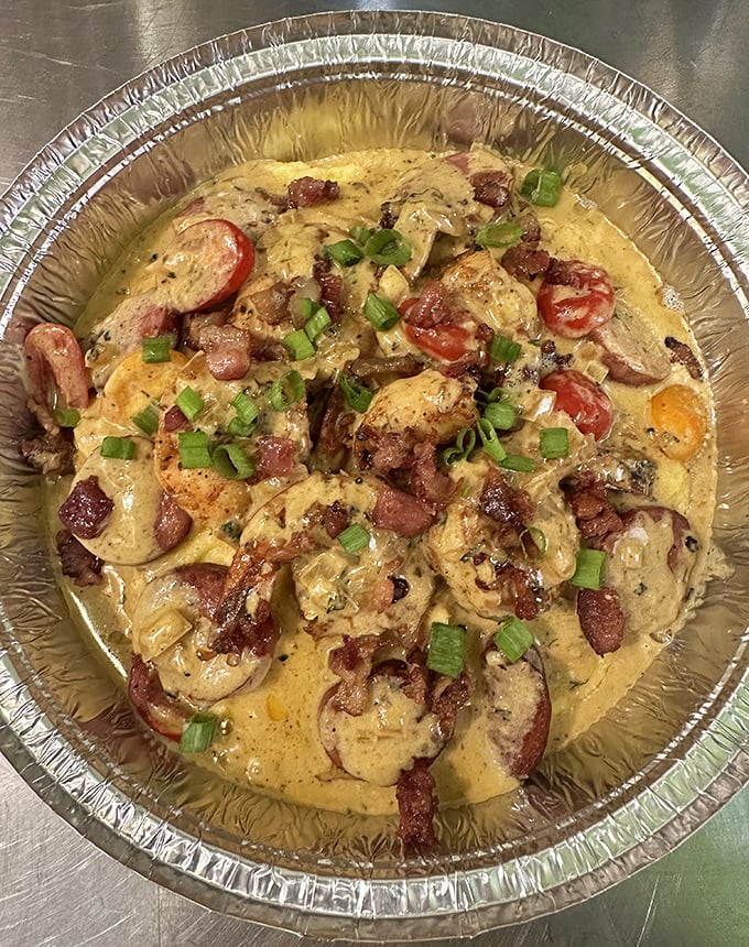 Shrimp and cheesy grits with bacon that would make a Southern grandmother nod in approval while adding a dash of island flair.