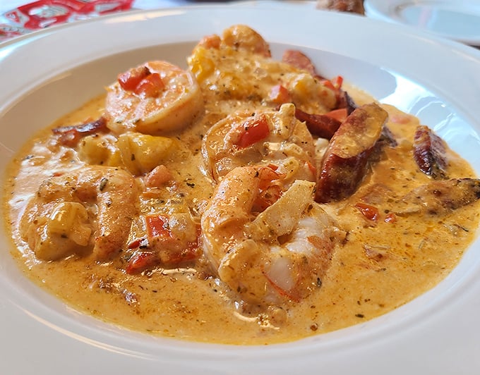 Shrimp swimming in a creamy sea of grits—Southern comfort that makes you wonder if Delaware has been secretly annexed by Charleston.