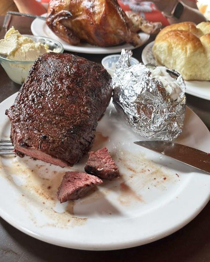 This isn't just dinner—it's a carnivorous challenge. That steak could feed a family of four or one very determined cowpoke.