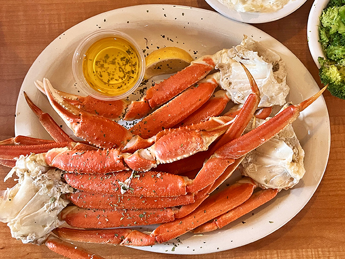 Snow crab legs that require commitment and proper technique. The kitchen provides the tools; you provide the determination and appetite.