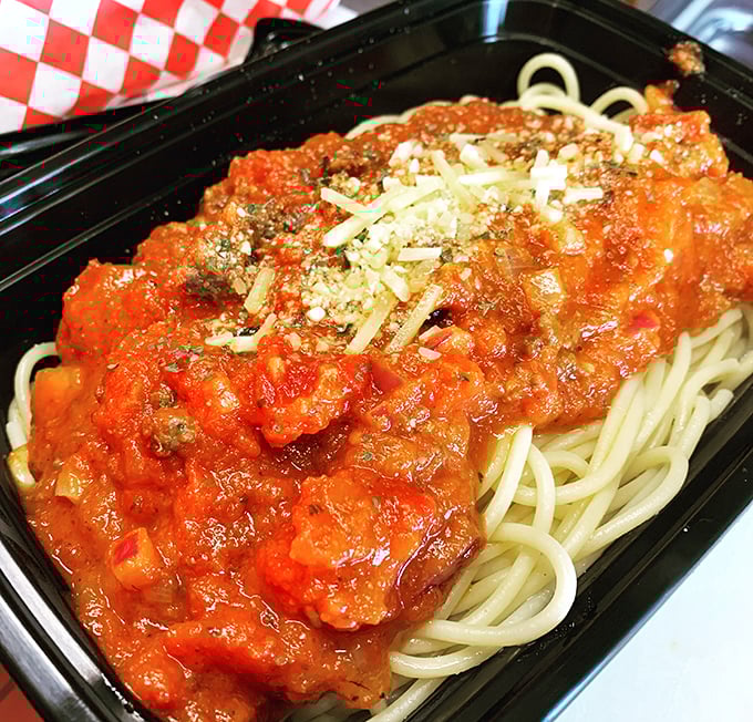 Spaghetti that doesn't apologize for being exactly what you want. That sauce looks like it's been simmering since breakfast.