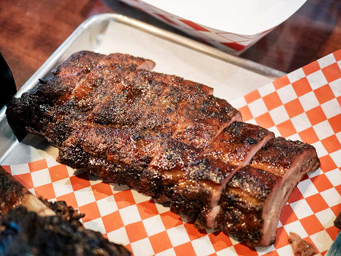 Spare ribs glazed to perfection, proving that sometimes messy eating is the only proper way.
