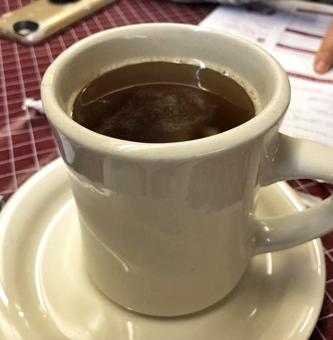 The humble diner mug—vessel of liquid ambition and endless refills. This coffee isn't pretentious, but it gets the job done beautifully.
